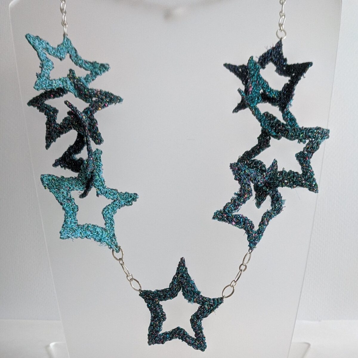 Linked Stars Necklace from Artizan Made, A Handmade Collective of ...